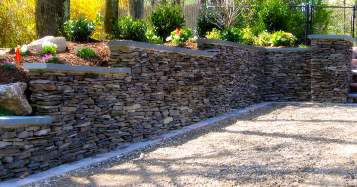 What a Naturally Stacked Stone Retaining Wall Looks Like | Autumn Leaf